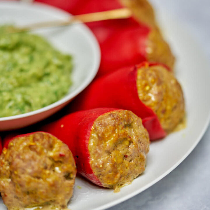 Lamb Stuffed Piquillo Peppers with Avocado Lime Sauce - Proportional Plate